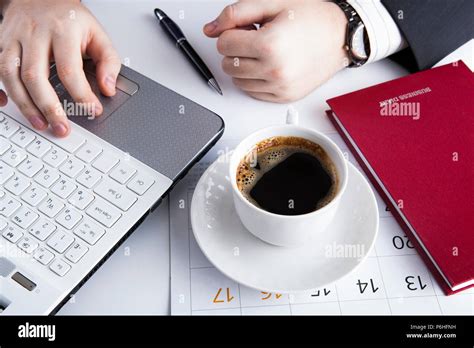 Human Hands On The Notebook Keyboard Close Up Stock Photo Alamy