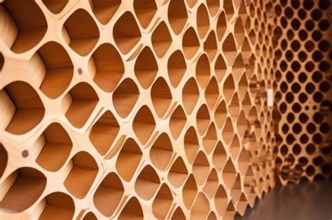 Premium Ai Image Minimalistic Hexagonal Beehive Pattern On A Wall