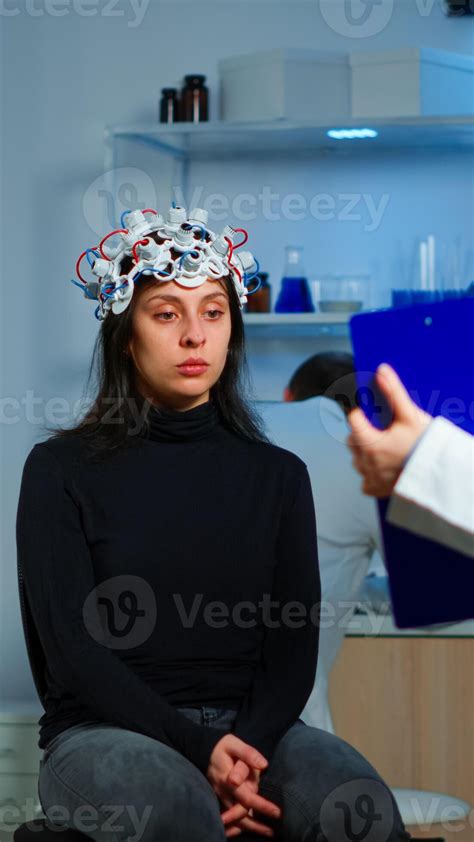 Medic Researcher Pointing At Clipboard Explaning Treatment Against