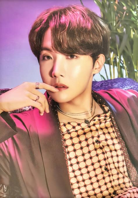 Download Cute Bts J Hope In Brown Top Wallpaper