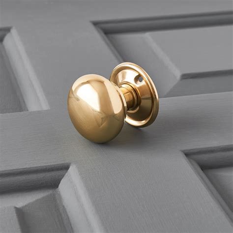 Cottage Door Knobs In Brass
