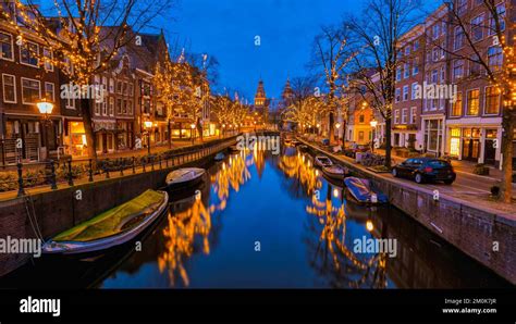 Christmas In Amsterdam Canals With Christmas Lights During December