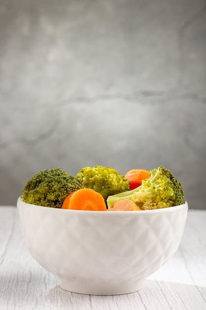 Premium Photo Bowl With Broccoli And Carrot Salad