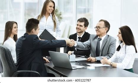 Business Meeting Table Handshake Business Partners Stock Photo