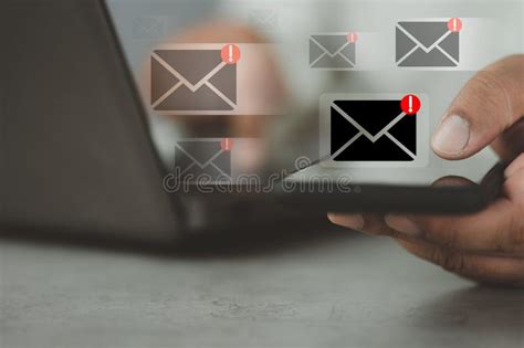 Hand Of Man Using A Smartphone For Many Email With Notification Alert Electronic Documents