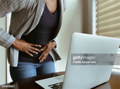 Women Pelvic Pain Photos And Premium High Res Pictures Getty Images