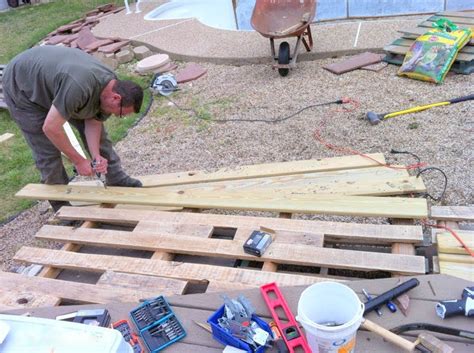 Build A Wooden Pallet Deck For Under Remodelaholic