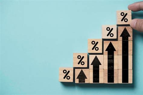Hand Putting Percentage With Increasing Up Arrow For Financial Interest