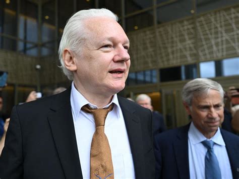 Julian Assange Free Supporters Track Flight Back To Australia Herald Sun