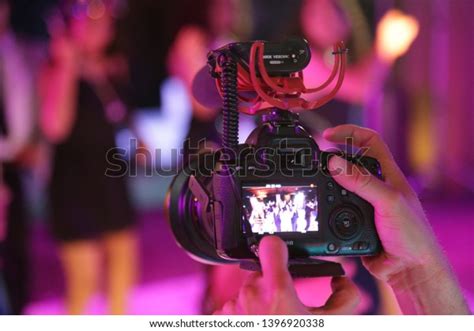 Holding Camera Event Photos And Images Shutterstock
