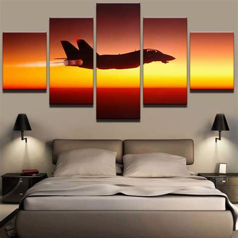 An Airplane Is Flying In The Sky At Sunset Multi Panel Canvas Wall Art
