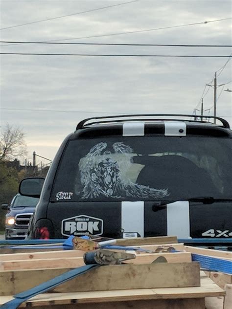 elaborate spawn decal on the back of this suv r spawn