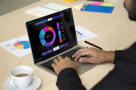 Analyst Working With Business Analytics And Data Management System On