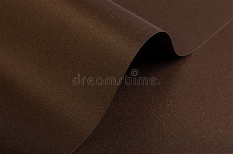 Warm Brown Paper Background With A Smooth Grainy Texture And Metallic Bronze Shimmer A Subtle
