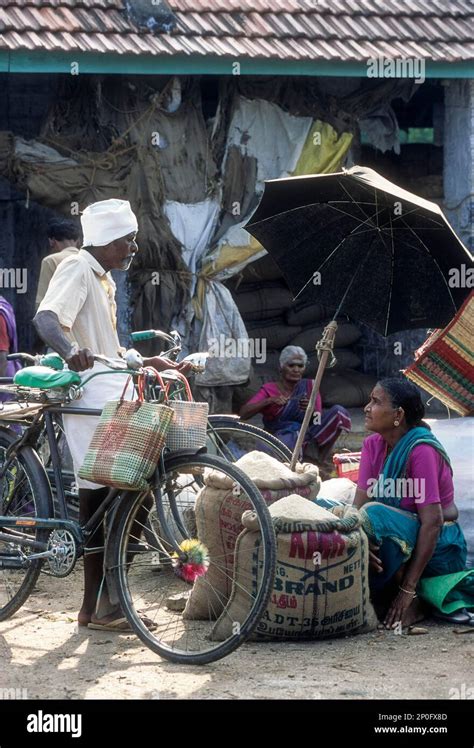 A Village Woman Selling Rice In Thudilur Periodical Market Near