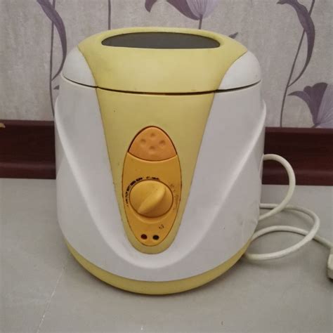 کمدا قیمت و خرید سرخ کن مینی رنگ زرد سایز کوچک وزن 800 شکستنی بله