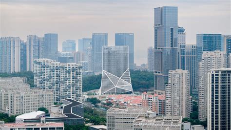 Oma Wraps Jomoo Headquarters In White Ceramic Stripes