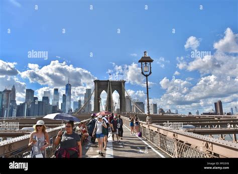 The Iconic Brooklyn Bridge Spanning The East River Between Lower