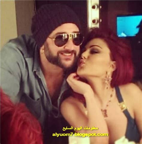 صور مثيرة وقبلة ساخنة من هيفاء وهبي للمصور