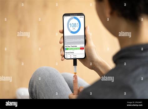Blood Sugar Glucose Level Device With Glucometer Mobile Phone App Stock Photo Alamy