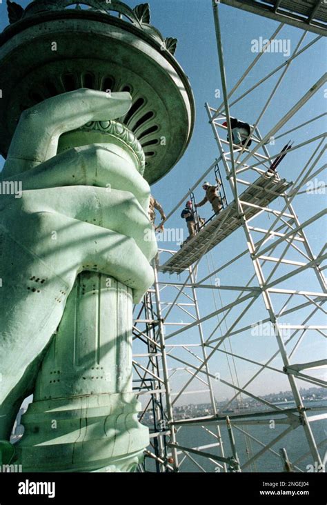 Workers Are Shown In New York On Dec 17 1985 Removing Scaffolding