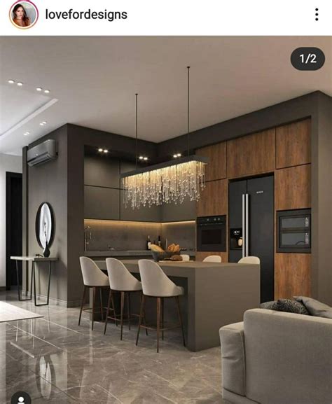 The Modern Kitchen Is Clean And Ready To Be Used As A Dining Room Or