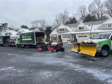 One Of Our Shoveling Teams Getting Property Drains Ready For The
