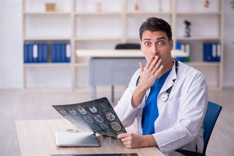 Young Male Doctor Radiologist Sitting In The Clinic Stock Image Image