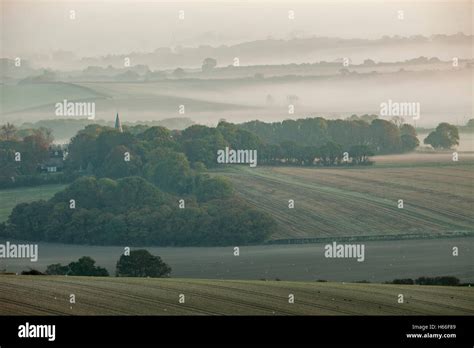 Misty Autumn Dawn On The South Downs Near Berwick East Sussex England