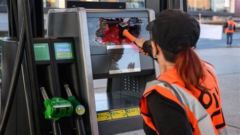 London Petrol Stations Damaged By Anti Oil Protesters Bbc News
