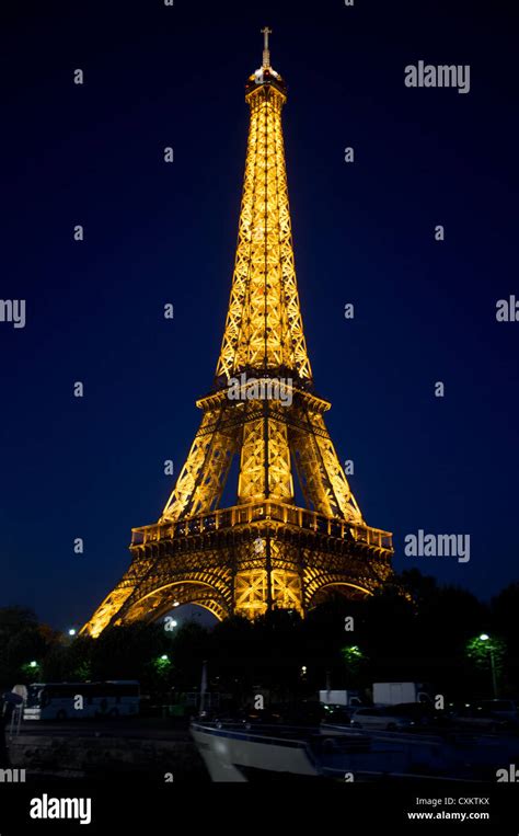 The Eiffel Tower Lit Up At Night Stock Photo Alamy