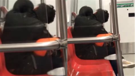 Delhi Metro Viral Video Couple Caught Kissing Each Other In A Metro