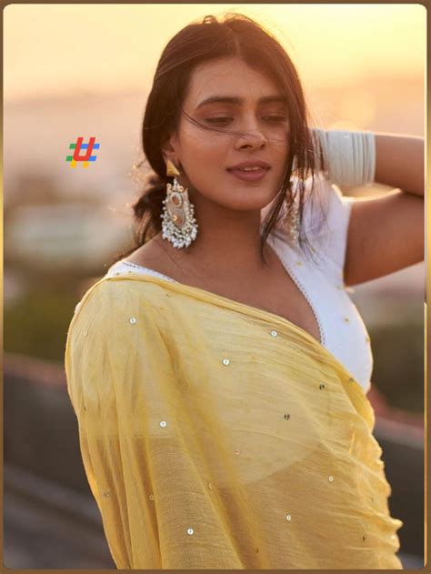 Hebba Patel Stuns In Yellow Saree Hashtagu Telugu