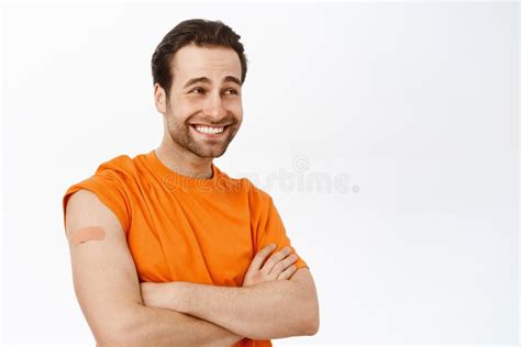 Handsome Healthy Guy Smiles Shows Shoulder With Band Aid After Covid
