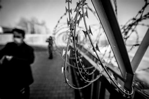 Shallow Depth Of Field Selective Focus Image With The Hand Of A Man Holding An Access Card