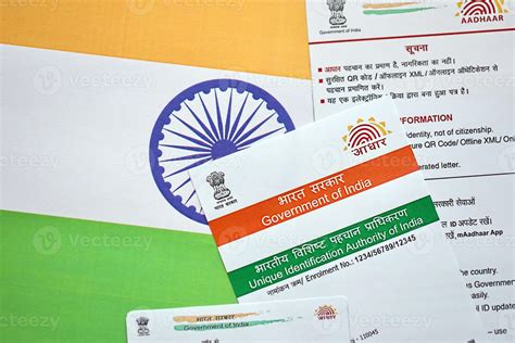 Indian Aadhaar Card From Unique Identification Authority Of India On Indian Flag 46538725 Stock