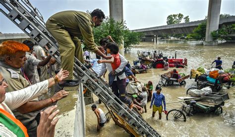 Deadly Monsoon Flooding Forces Mass Evacuations In Indias Capital