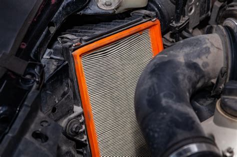Premium Photo Closeup On A Dirty Air Filter For An Engine With An