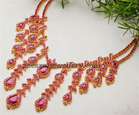 Trendy Ruby Set In Flowing Design Jewellery Designs