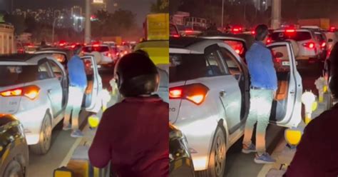 Stuck In Long Traffic Jam Man Forced To Pee In Middle Of The Road