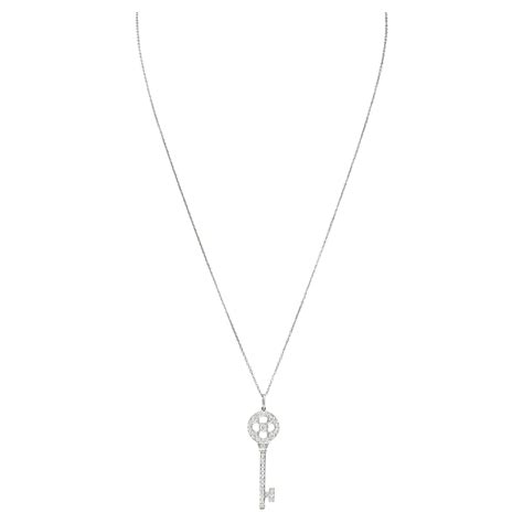 Tiffany And Co 051 Carat Diamond Platinum Quatrefoil Key Pendant