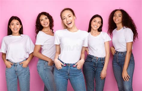 Five Multicultural Women Posing Over Pink Studio Background Stock Image