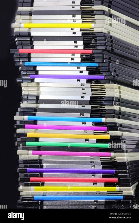 Tall Pile Of Old Floppy Disks Where Data Was Saved During The 1990s And 2000s In Computers Stock
