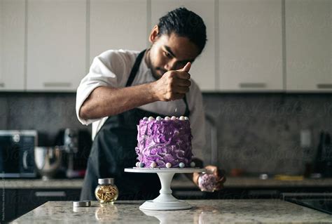 Pastry Chef Decorating A Cake Del Colaborador De Stocksy Pedro