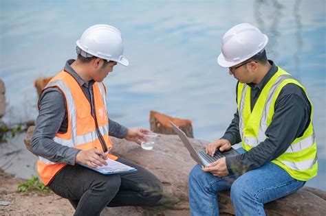 Premium Photo Environmental Engineers Inspect Water Qualitybring