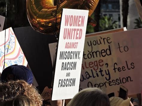 Premium Photo People With Posters During Protest