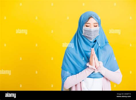 Asian Muslim Arab Woman Islam Wear Veil Hijab And Face Mask Raising