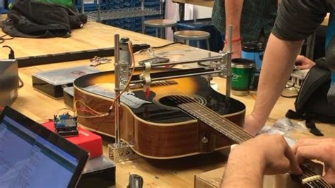 Guitar Playing Robot Performs American Music
