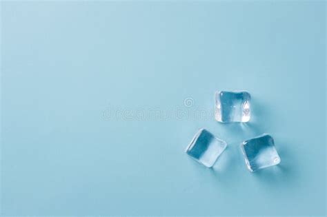 Top View Of Ice Cubes Of Different Sizes On Blue Background Stock Image