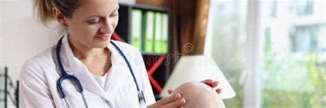 Female Dermatologist Examines Bald Male Patient With Hair Loss Problem